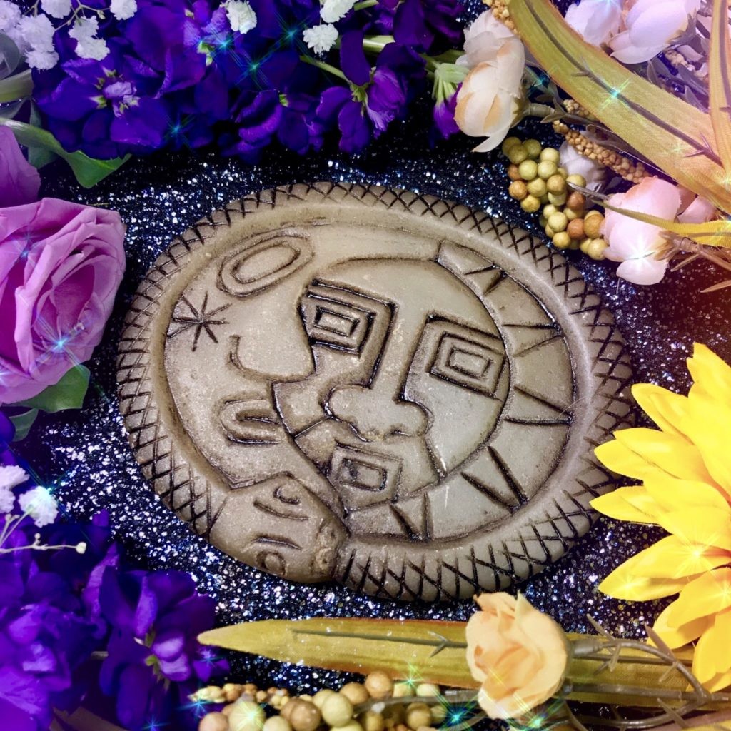 Peruvian Sun and Moon Ouroboros Carvings for embracing change